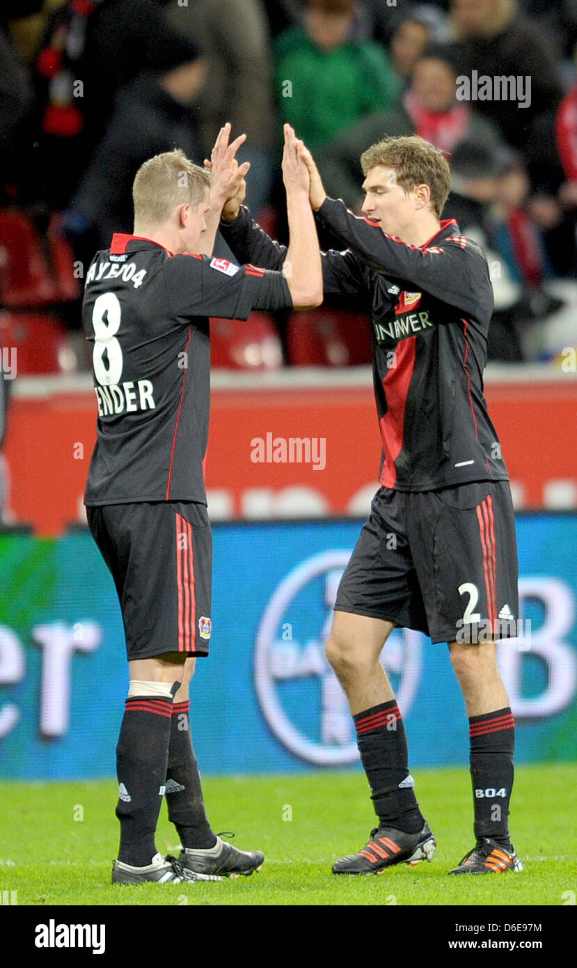 Leverkusen's Lars Bender and Stefan Reinartz cheers and celebrate after ...