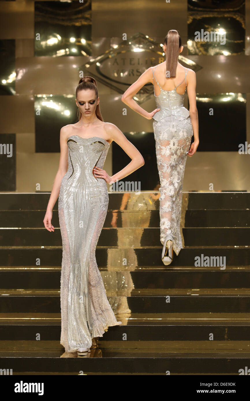 Models wears a creation by Italian designer Donatella Versace as part ...