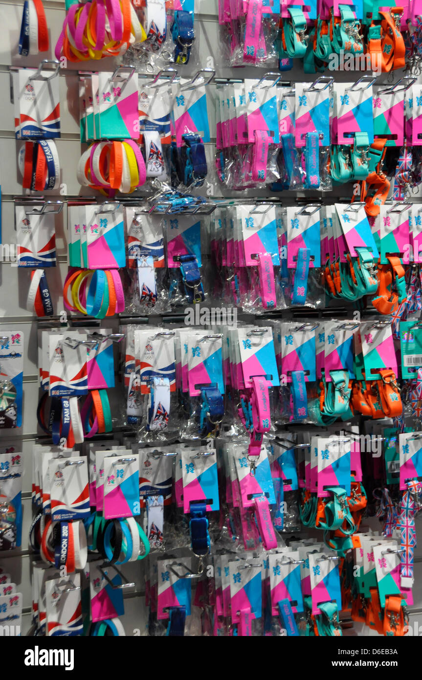 Arm bands and key chains with the logo of the 2012 Olympic Games are on ...