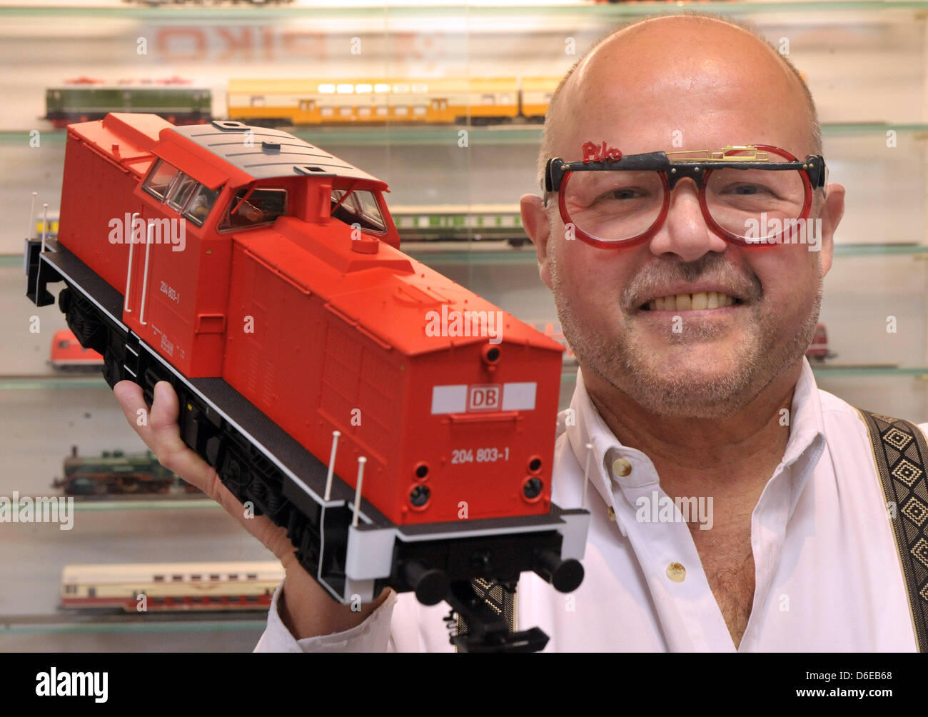 Rene F. Wilfer holds a garden railway locomotive BR 204 at the ...