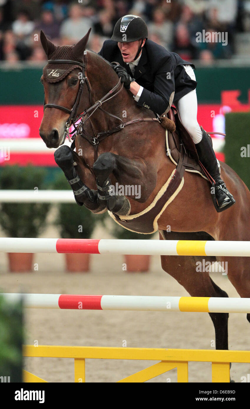 French rider Kevin Staut jumps over a hurdle on Zeta de Hus at the FEI ...