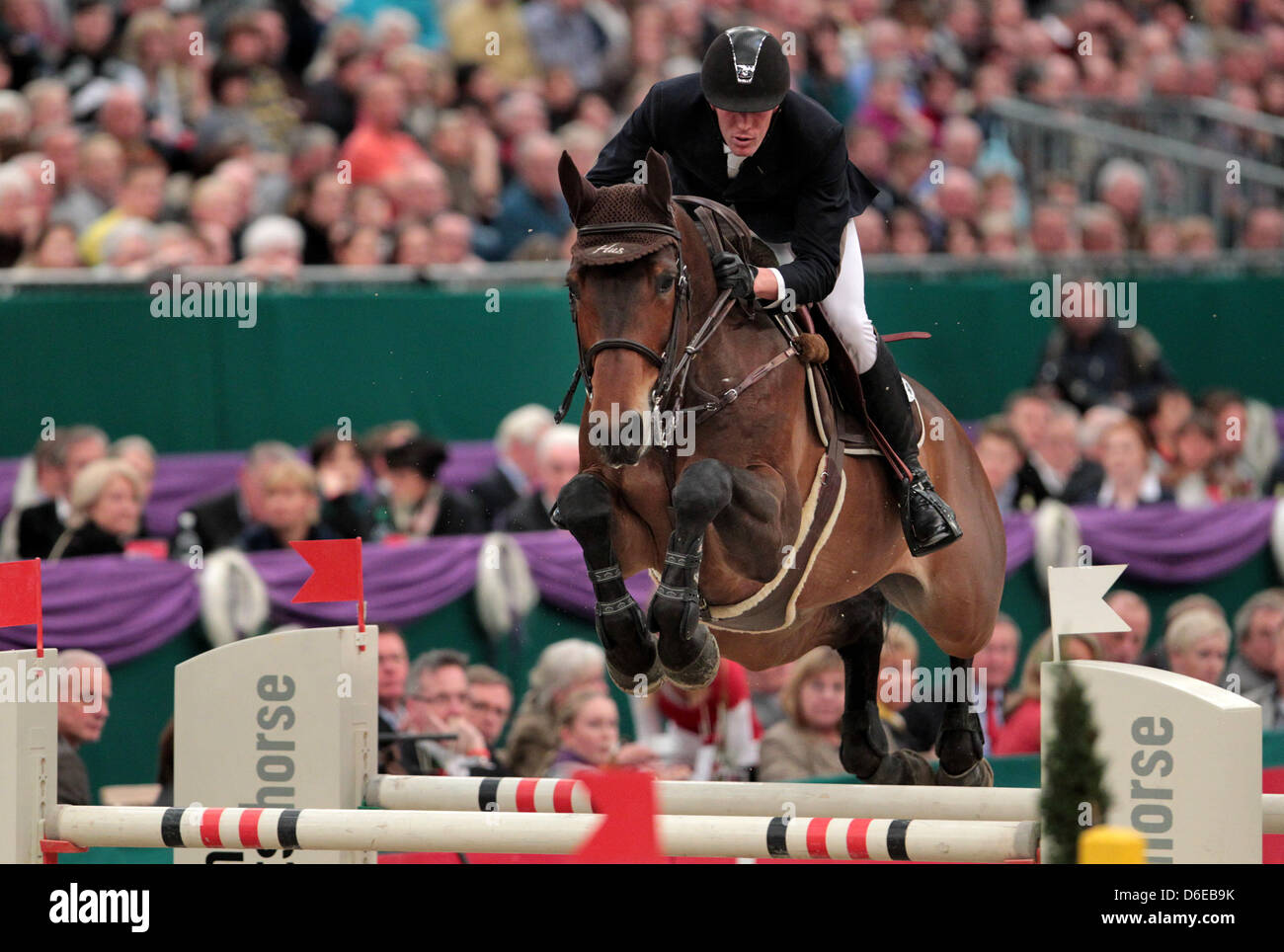 French rider Kevin Staut jumps over a hurdle on Zeta de Hus at the FEI ...