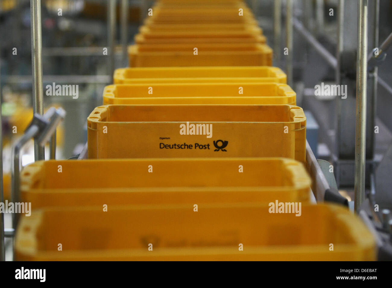 Yellow mail crates are pictured in the mail center of the Deutsche Post ...