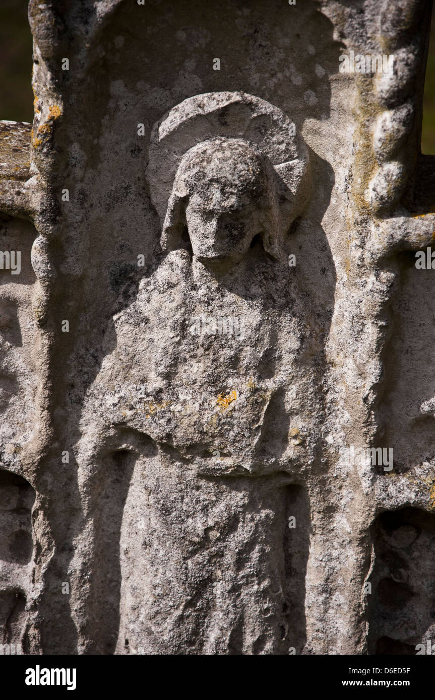 Weathered stone statue of saint or Jesus Stock Photo - Alamy