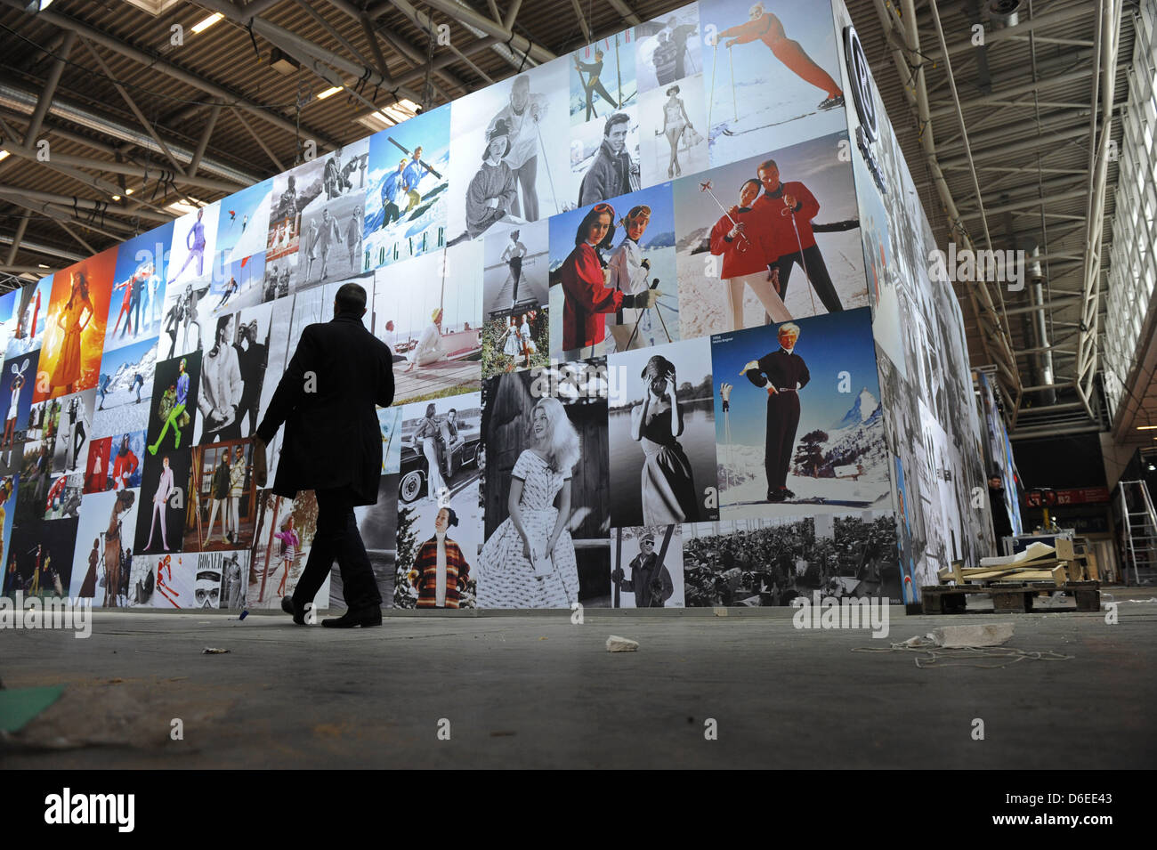 A man walks past a booth of the sports goods fair ispo in Munich ...