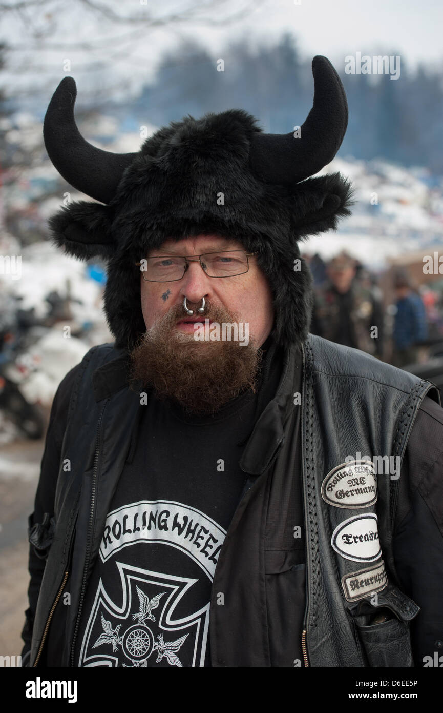 A motorcycle enthousiast stands on the grounds of the Elephant Rally in ...