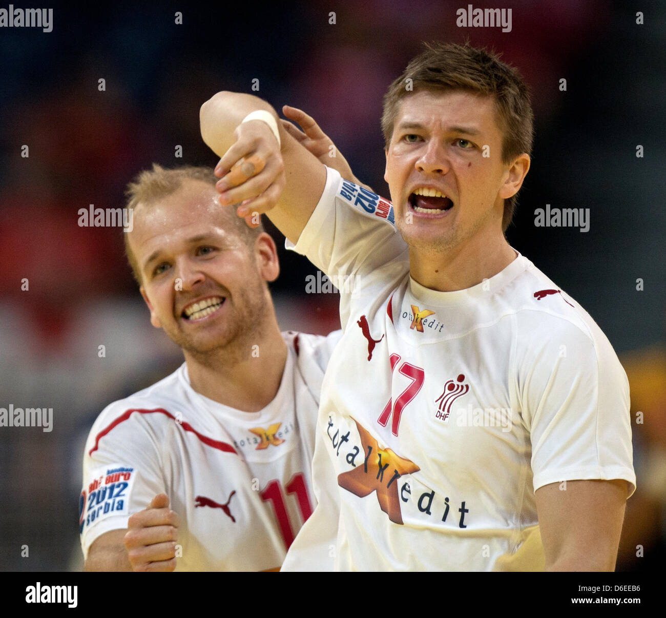 Denmark's Niklas Jacobsen Landin (R) and Anders Jensen Eggert cheers ...