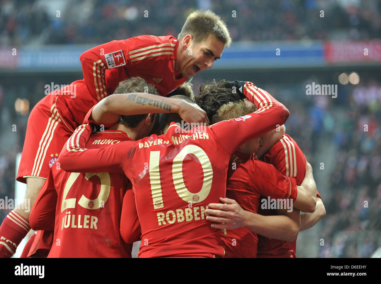 Bayern Munich's Philipp Lahm (top) and his team celebrate the 1-0 ...
