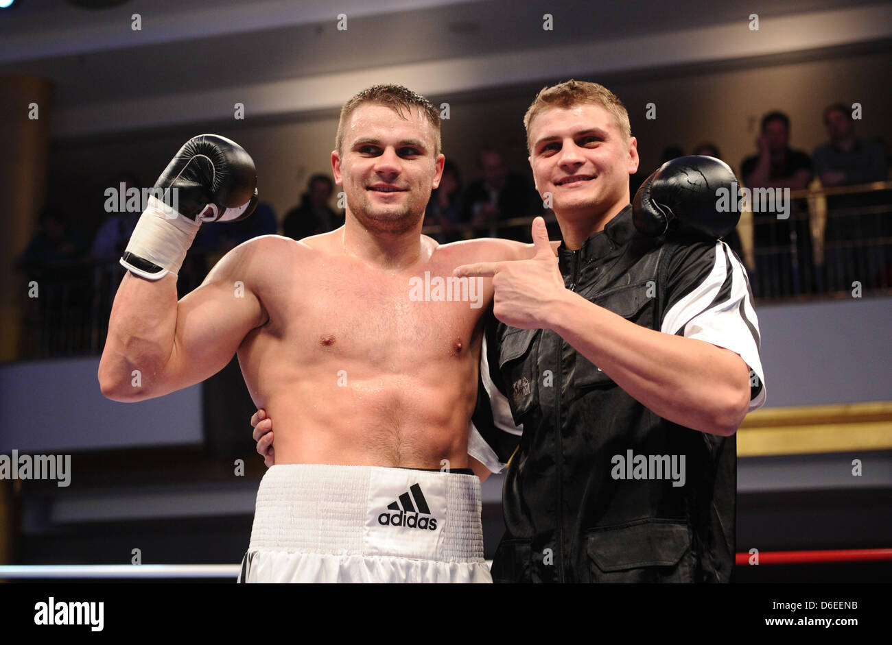 Heavyweight boxer Denis Boytsov (L) from Russia celebrates with his ...