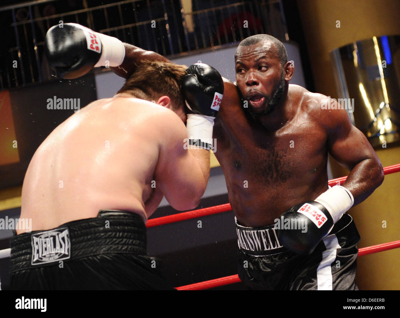 Heavyweight boxers Ruslan Chagaev (L) from Uzbekistan and Kertson ...
