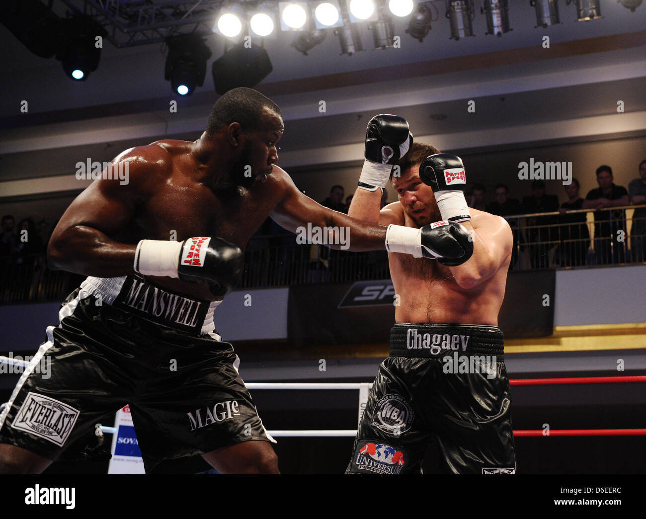 Heavyweight boxers Ruslan Chagaev (R) from Uzbekistan and Kertson ...