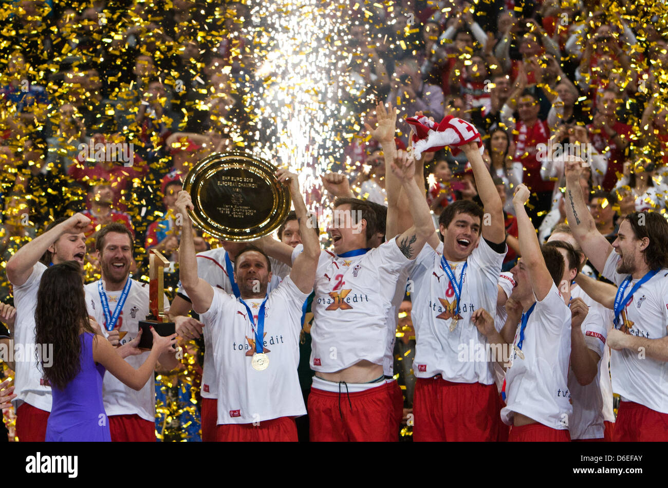 Denmark's Lars Christiansen (with trophy) and the Danish national ...
