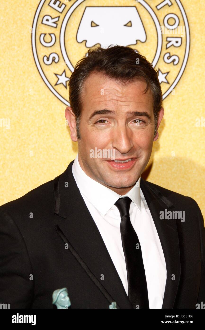 Best Actor Winner Jean Dujardin (France) poses in the press room of the ...