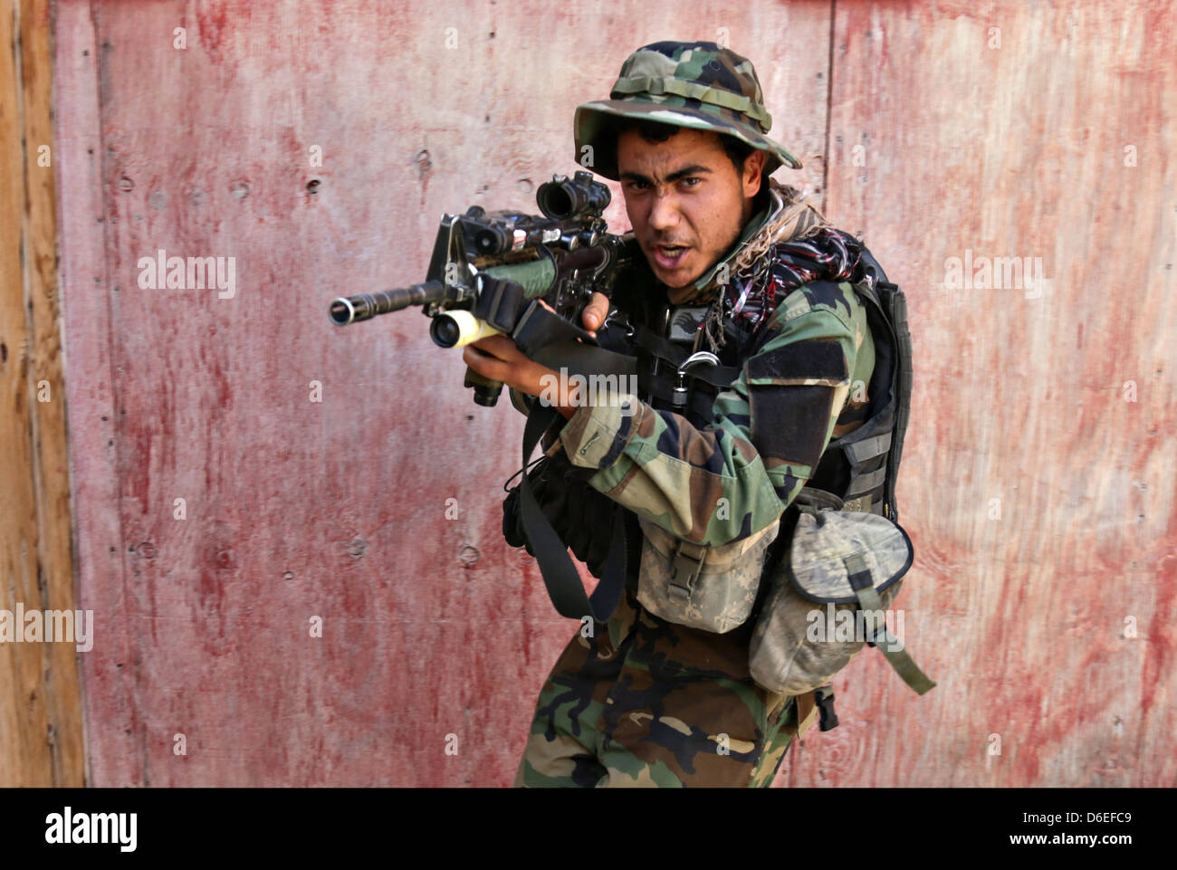An Afghan National Army commando with the 1st Special Operations Kandak ...