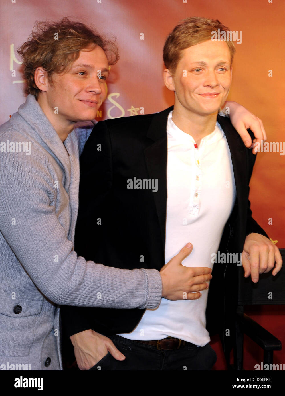 German actor Matthias Schweighoefer poses with his new wax figure at ...