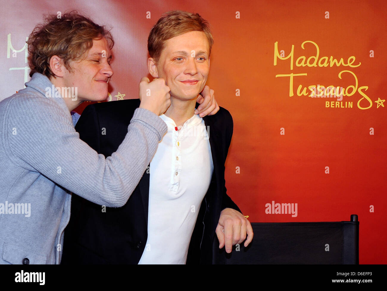 German actor Matthias Schweighoefer poses with his new wax figure at ...