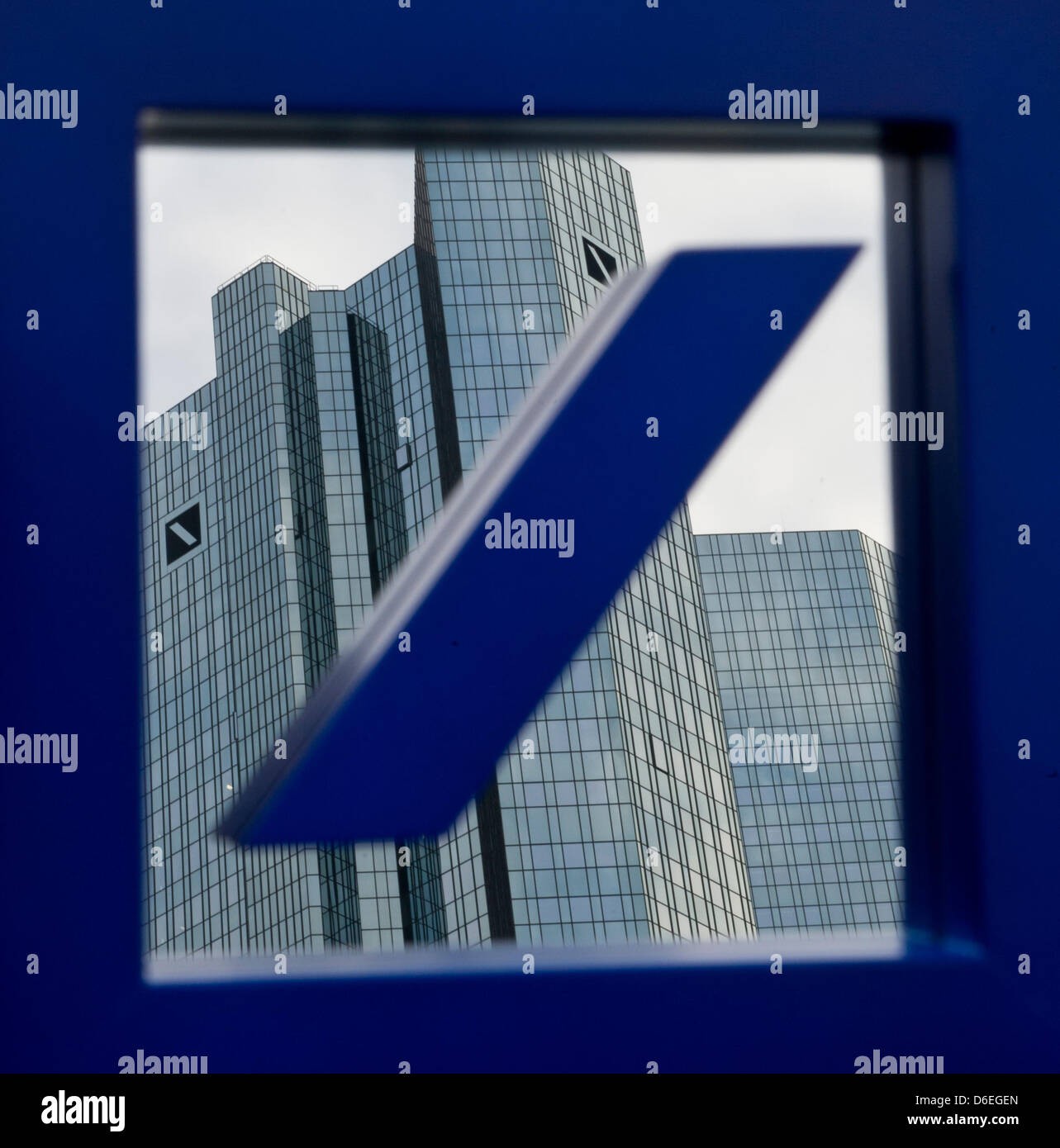 An illustration shows the headquarters of Deutsche Bank reflecting in a ...