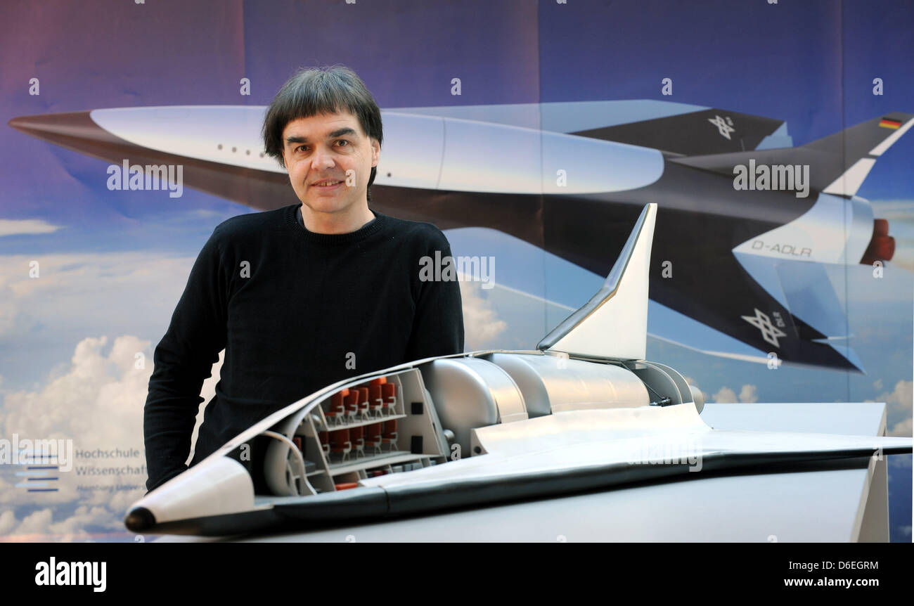 Scientist Martin Sippel presents the 1-30 scale model of the rocket ...