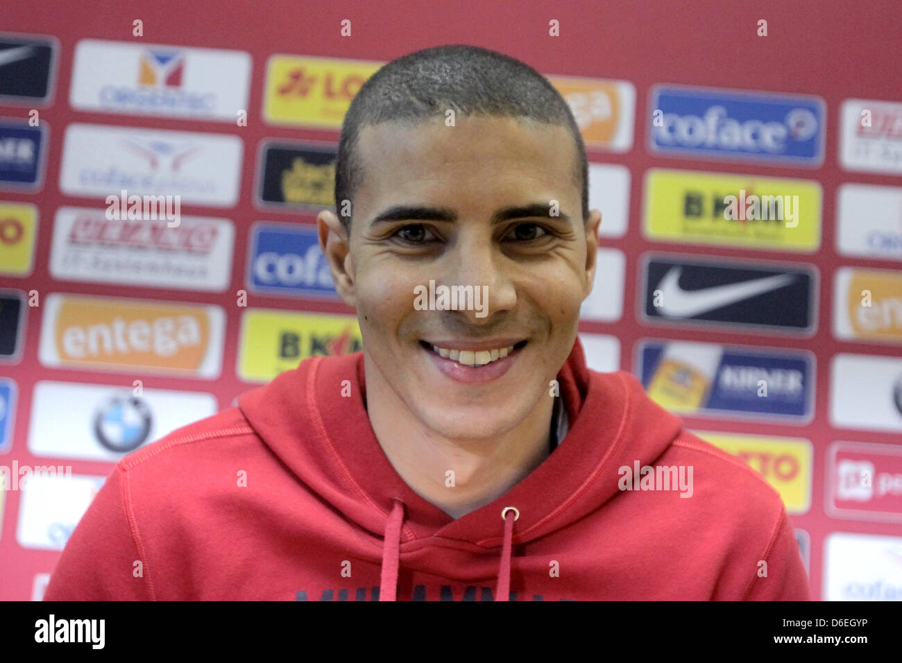 Soccer player Mohamed Zidan smiles during a press conference of ...