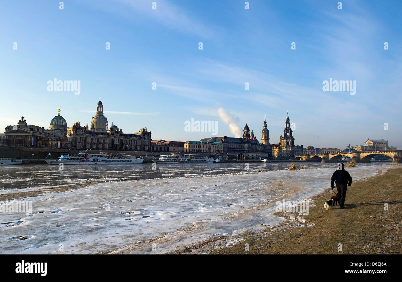 Ice floes drift down the Elbe river in front of the historical ...