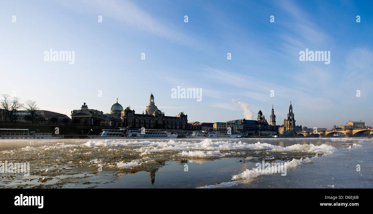 Ice floes drift down the Elbe river in front of the historical ...