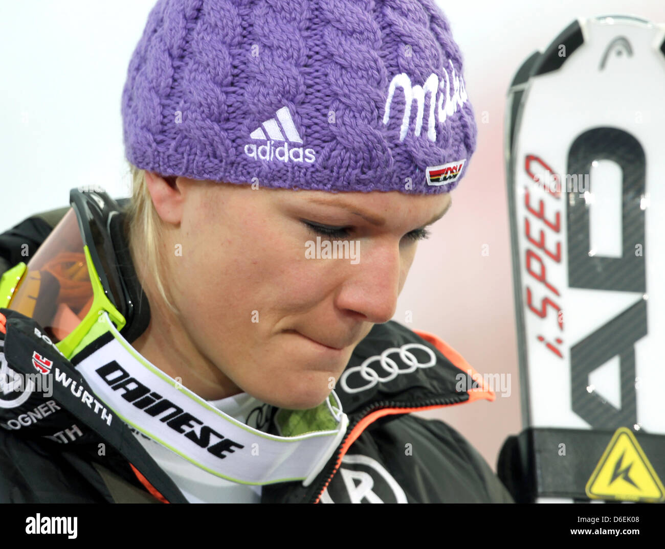Fourth placed Maria Hoefl-Riesch from Germany grimaces after the women ...