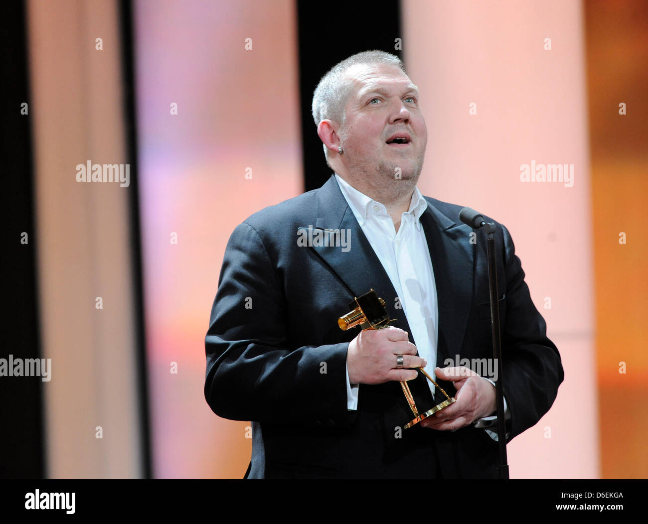 German actor Dieter Baer holds his trophy for Category "Best German ...