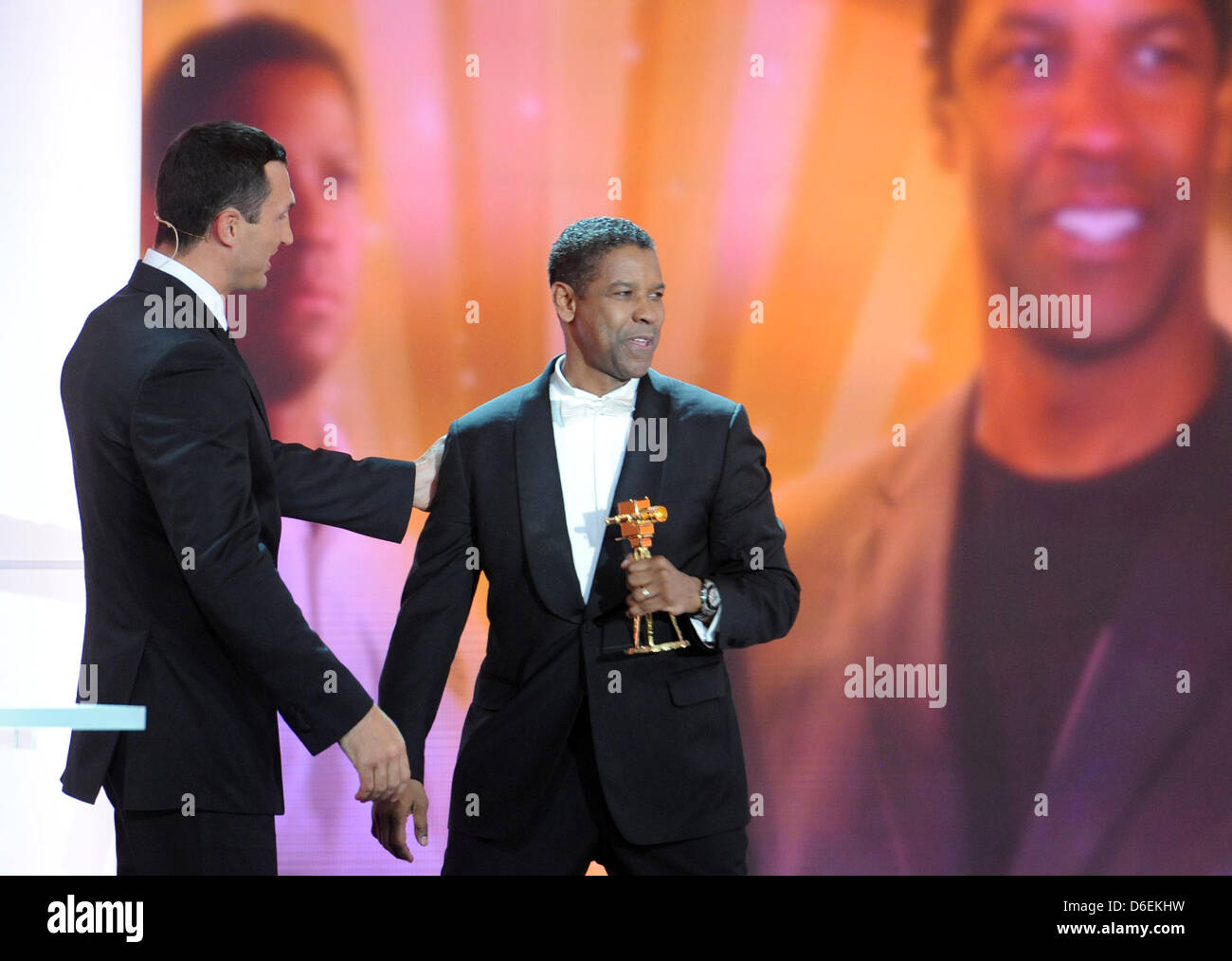 US actor Denzel Washington (R) is awarded by boxer Wladimir Klitschko ...
