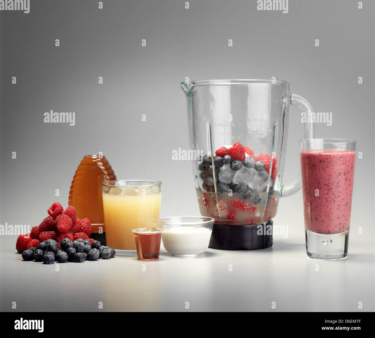 Apple, raspberry and blueberry smoothie Stock Photo - Alamy