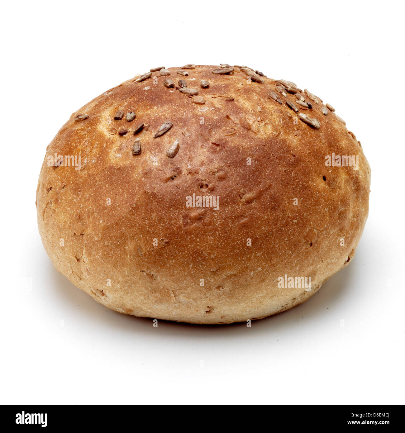 Seeded brown round loaf Stock Photo - Alamy