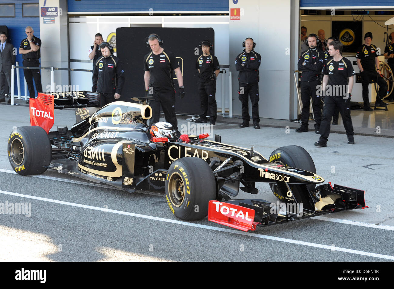 Finnish Formula One driver Kimi Raikkonen of Lotus returns from a run ...