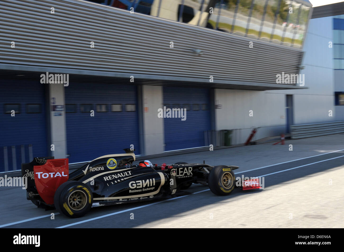 Finnish Formula One driver Kimi Raikkonen of Lotus steers his new E20 ...
