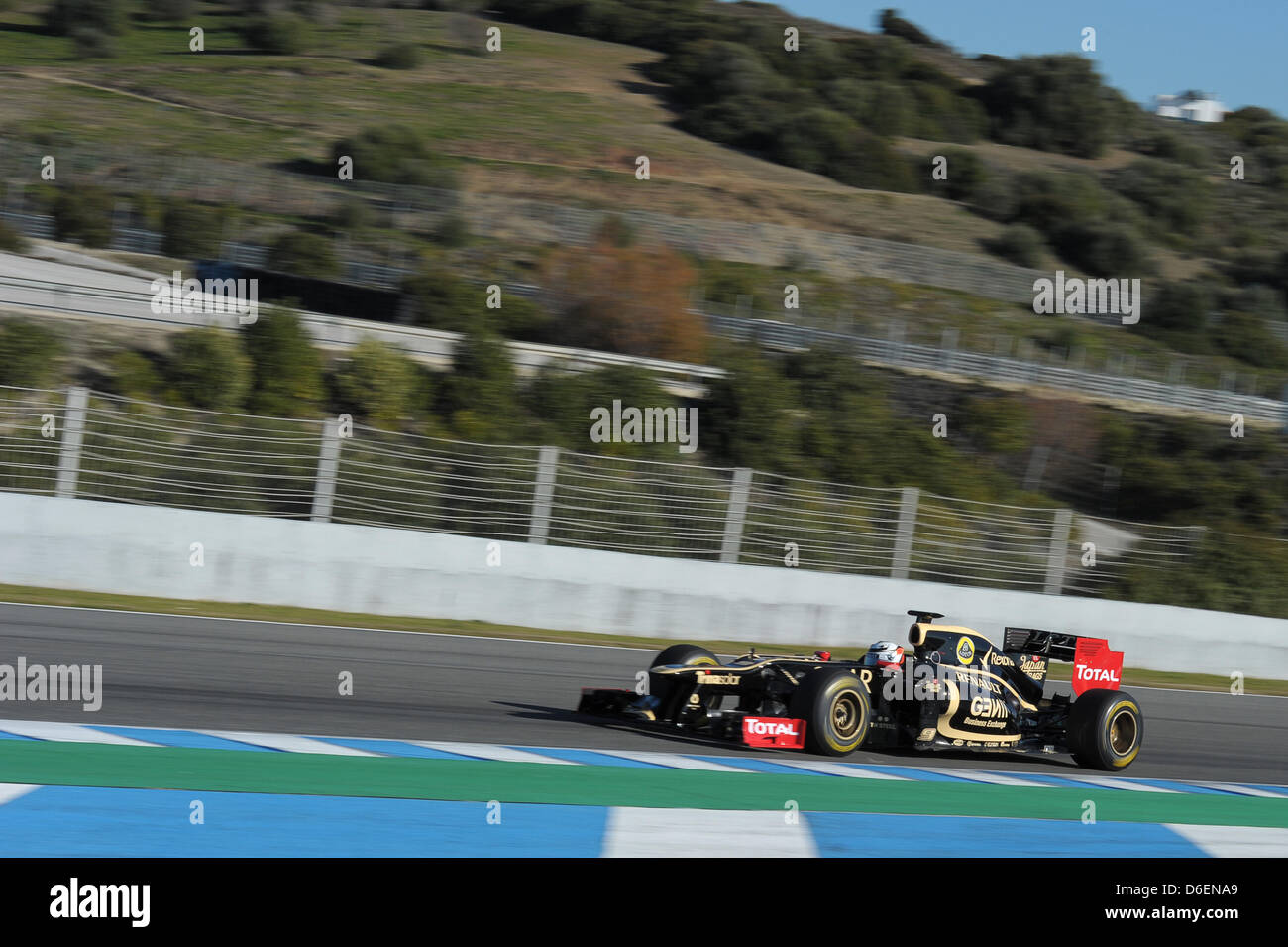 Finnish Formula One driver Kimi Raikkonen of Lotus steers his new E20 ...