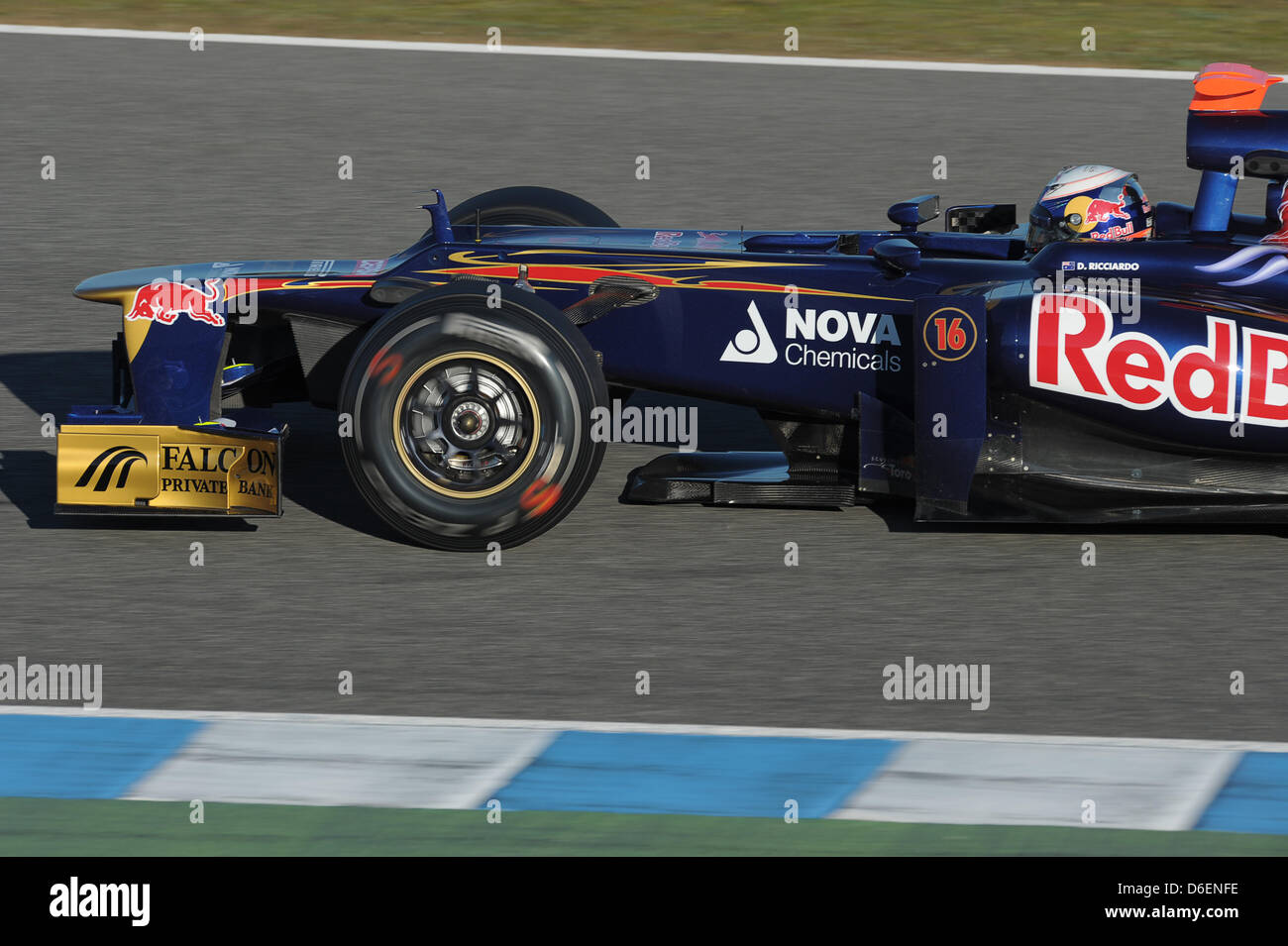 Australian Formula One driver Daniel Ricciardo of Toro Rosso steers his ...