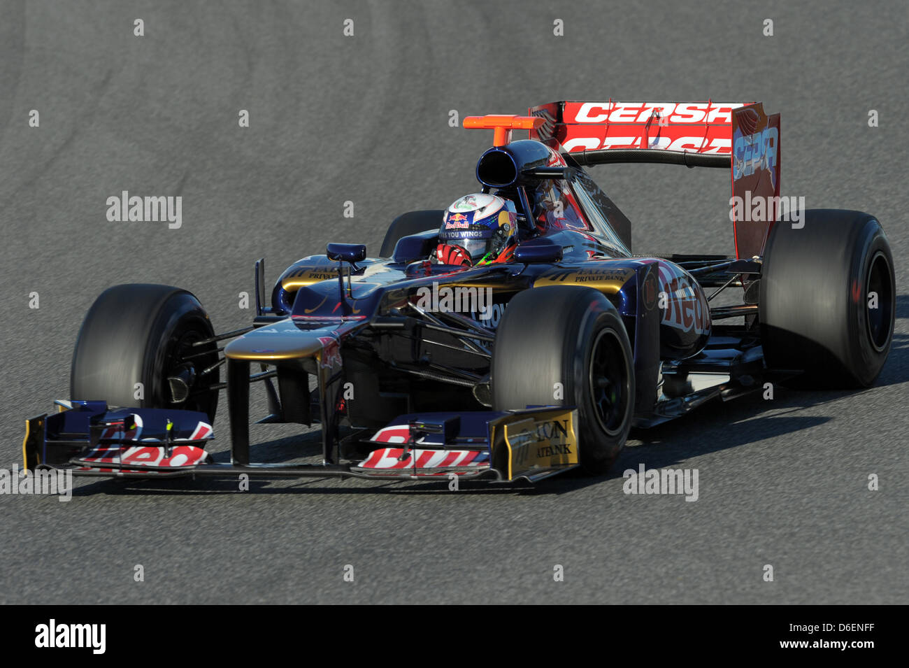 Australian Formula One driver Daniel Ricciardo of Toro Rosso steers his ...
