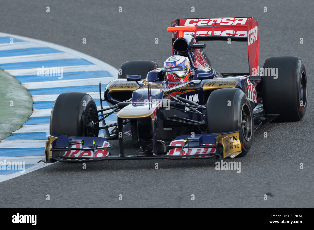 Australian Formula One driver Daniel Ricciardo of Toro Rosso steers his ...