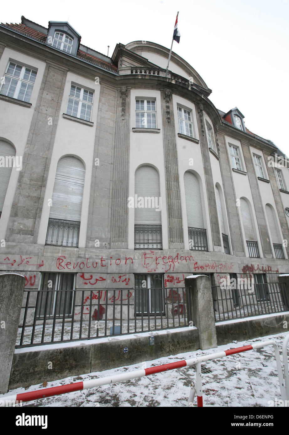 The words 'Freedom' and 'Revolution' are written on the wall of the ...