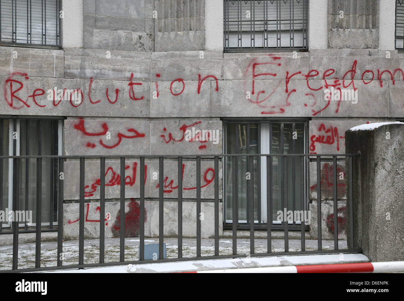 The words 'Revolution' and 'Freedom' is written on the facade of the ...