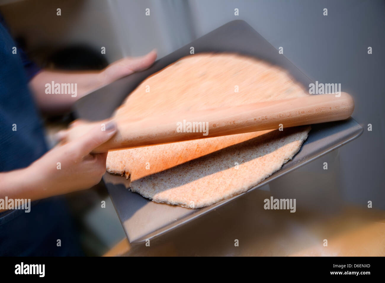 Pizza base on baking sheet/ step shot 10 Stock Photo - Alamy