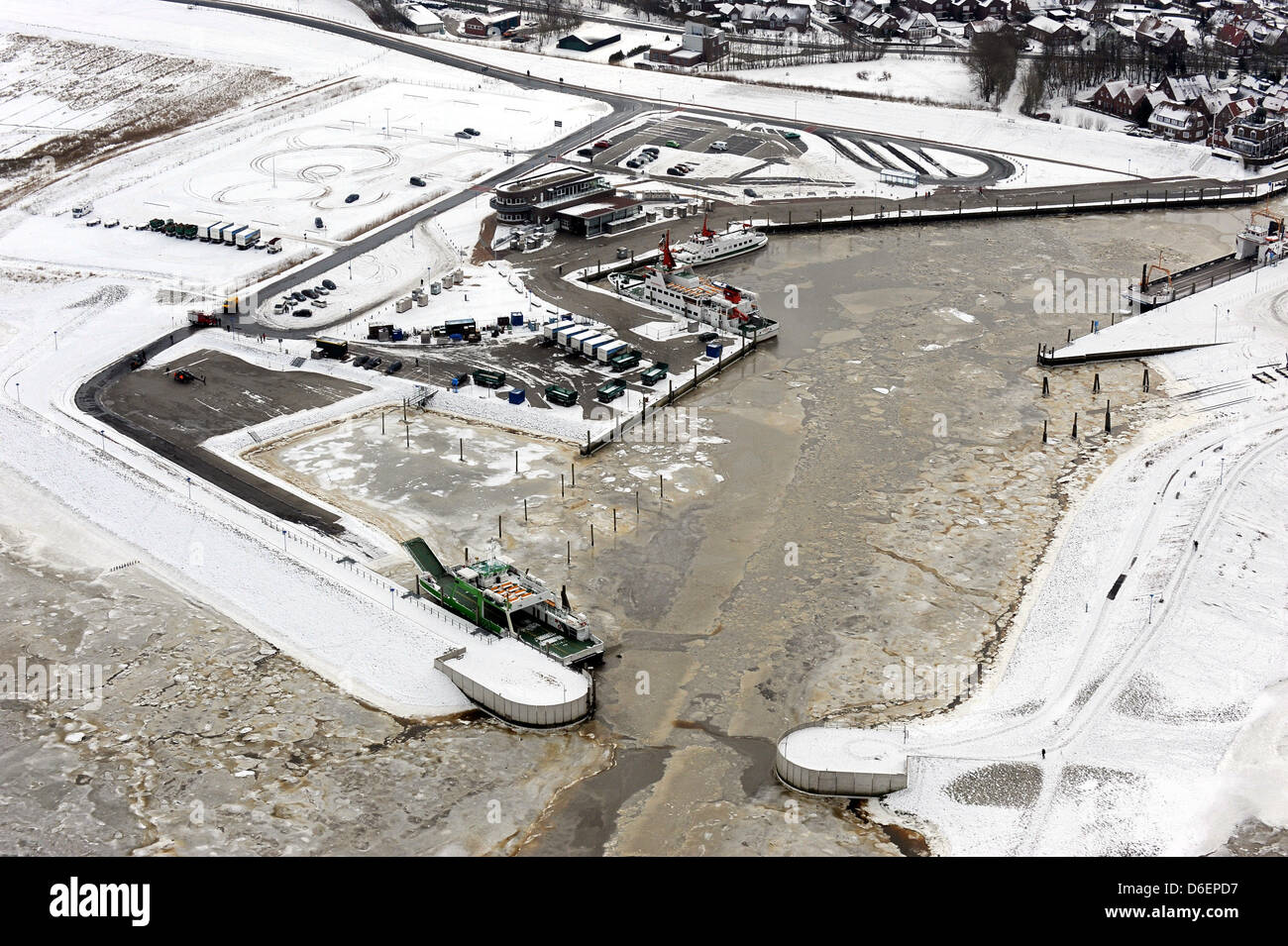 The ferry harbor is dormant during the frosty winter in ...