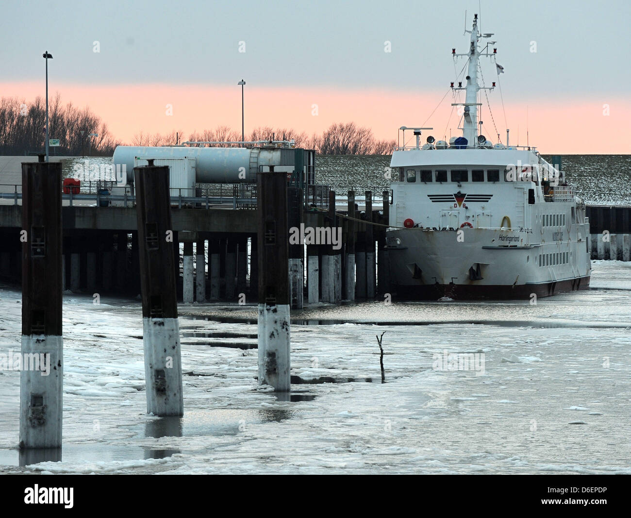 The ferry to Wangerooge Island "Harlingerland" is moored on the outer ...