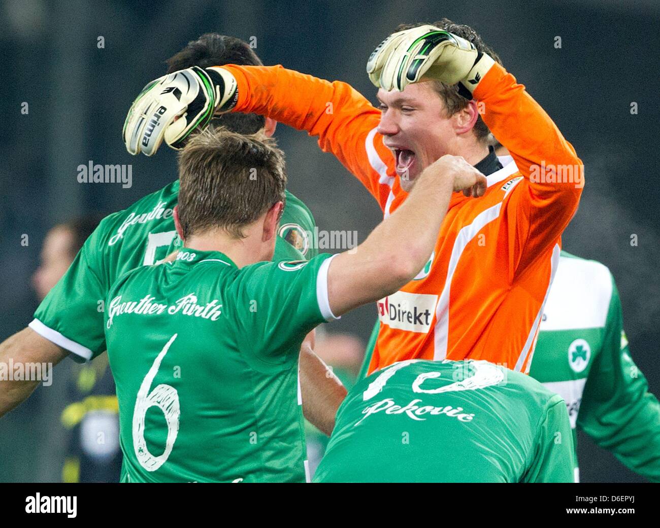 Greuther Fuerth's goalkeeper Max Gruen celebrates with team-mates after ...