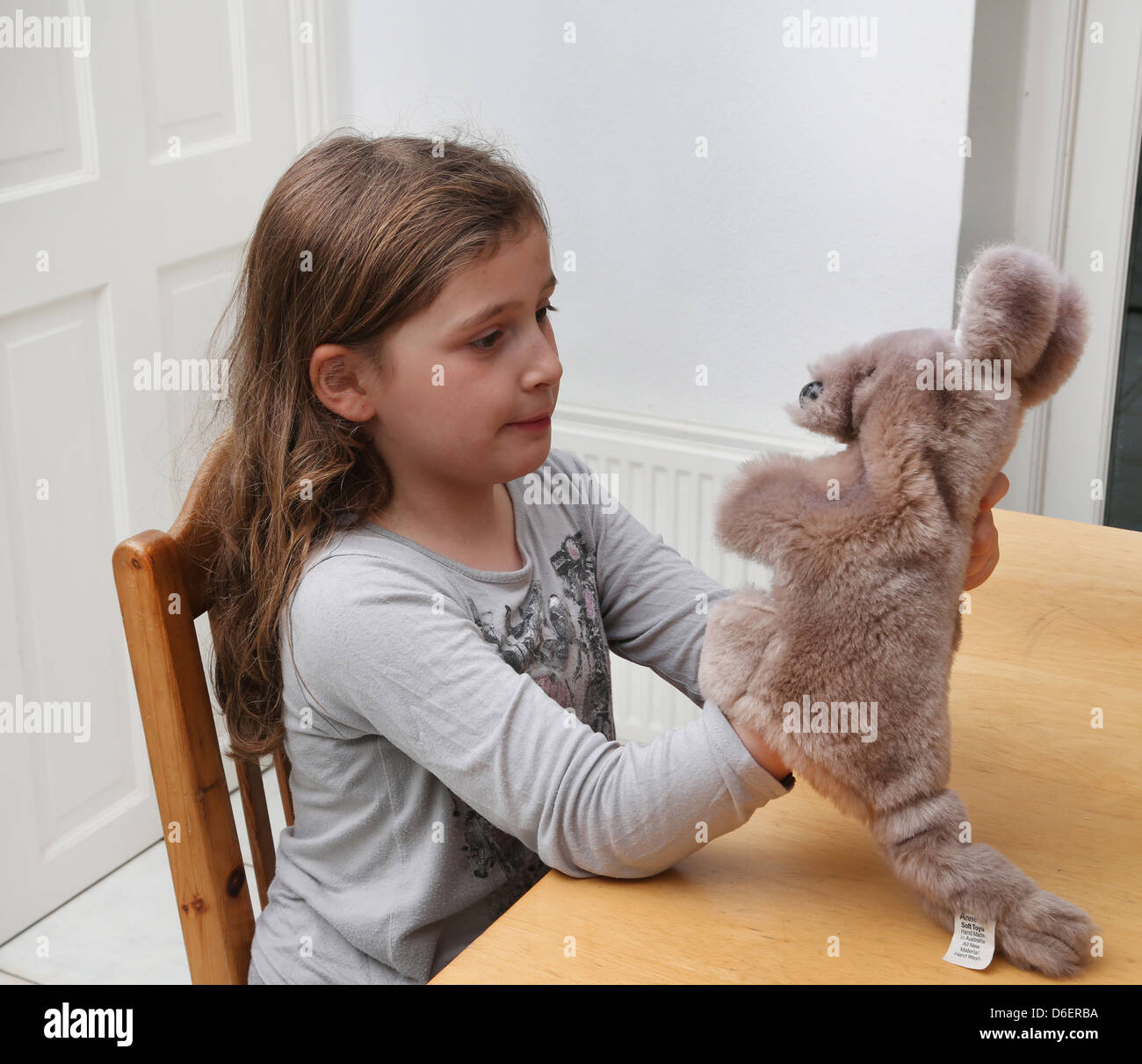 Girl Playing With Kangaroo Hand Puppet England Stock Photo - Alamy