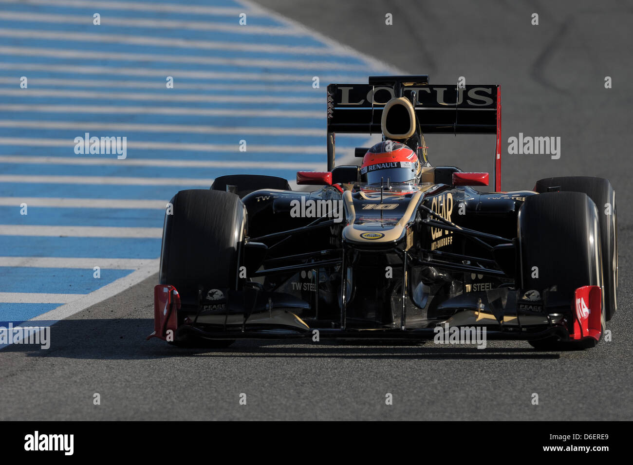 French Formula One driver Romain Grosjean of Lotus steers his new E20 ...