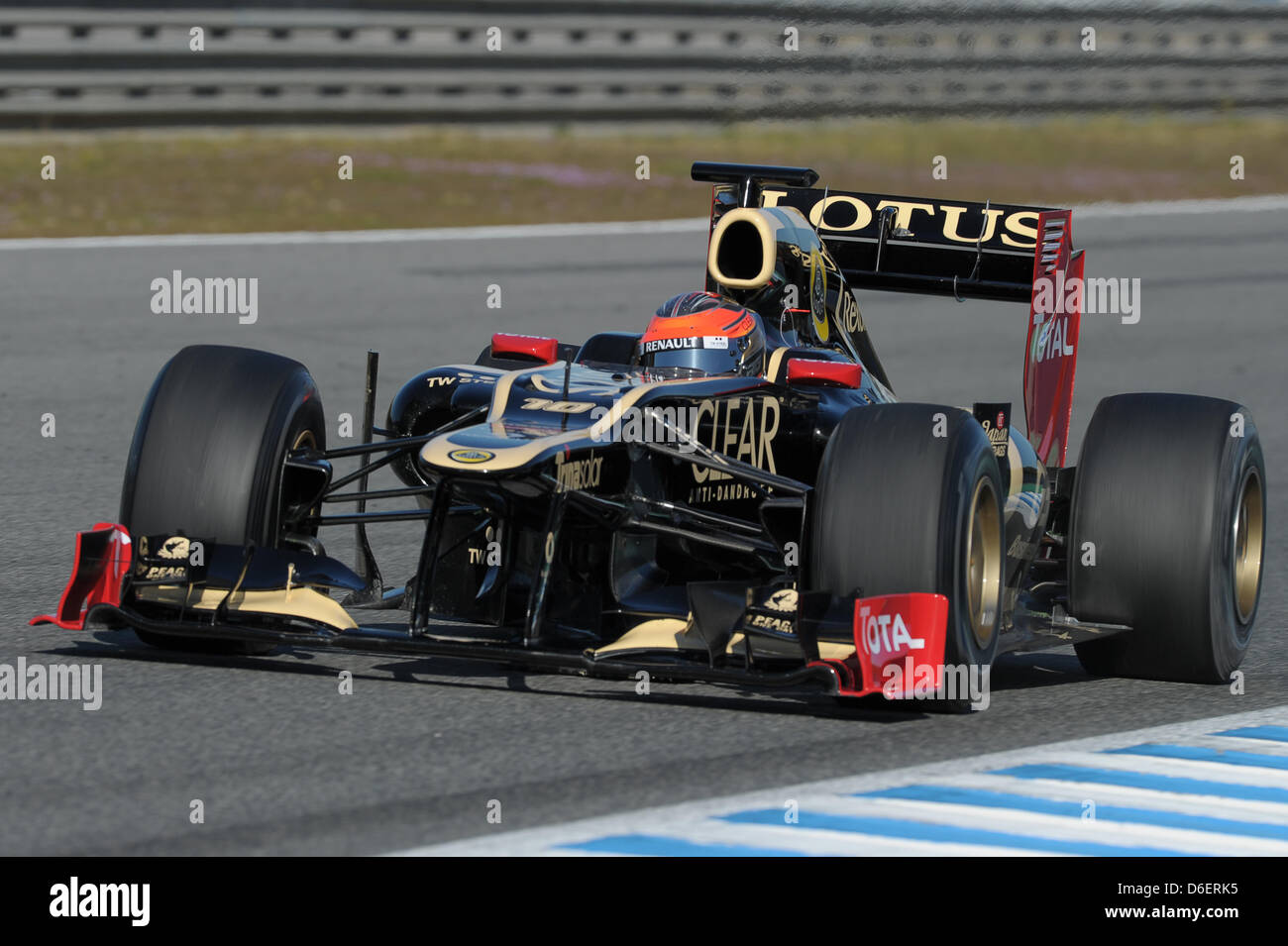 French Formula One driver Romain Grosjean of Lotus steers his new E20 ...