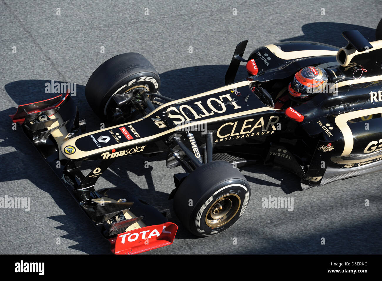 French Formula One driver Romain Grosjean of Lotus steers his new E20 ...
