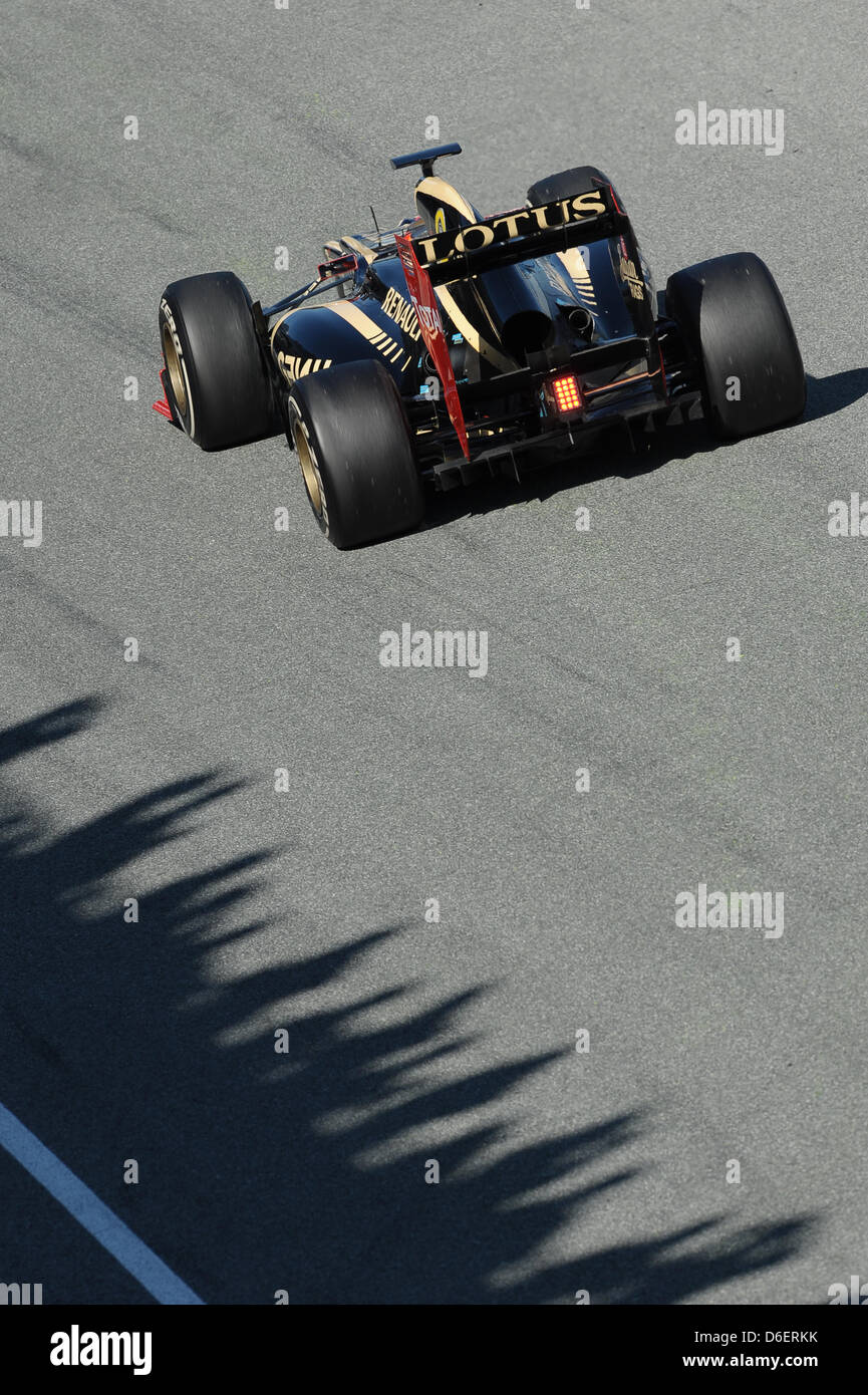 French Formula One driver Romain Grosjean of Lotus steers his new E20 ...