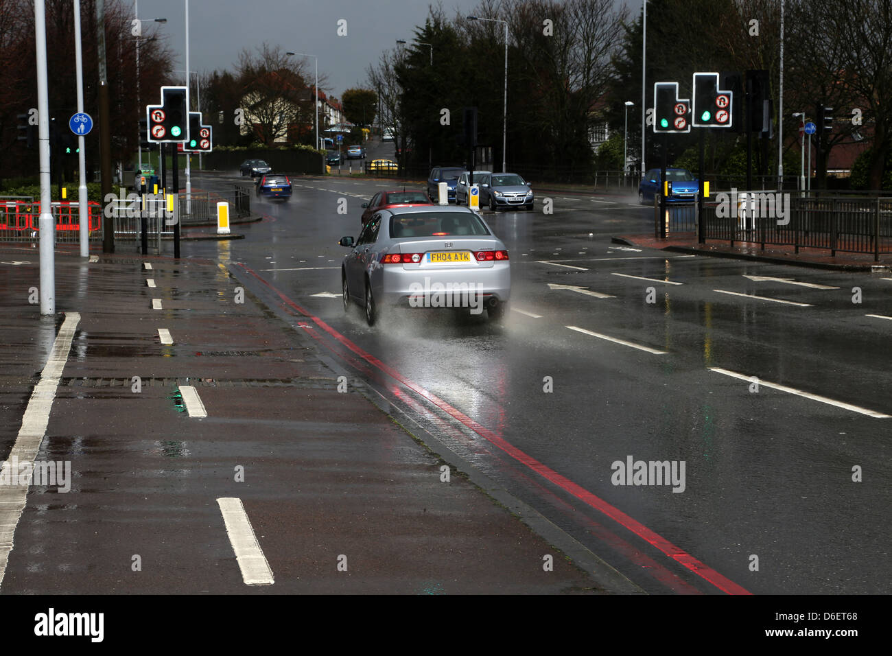 Cars At Traffic Lights On Crossroads in the Rain A217 Surrey England ...
