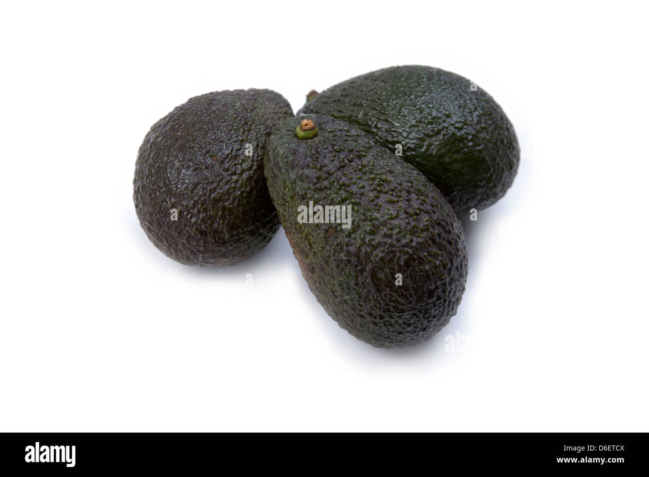 Three whole green avocados hi-res stock photography and images - Alamy