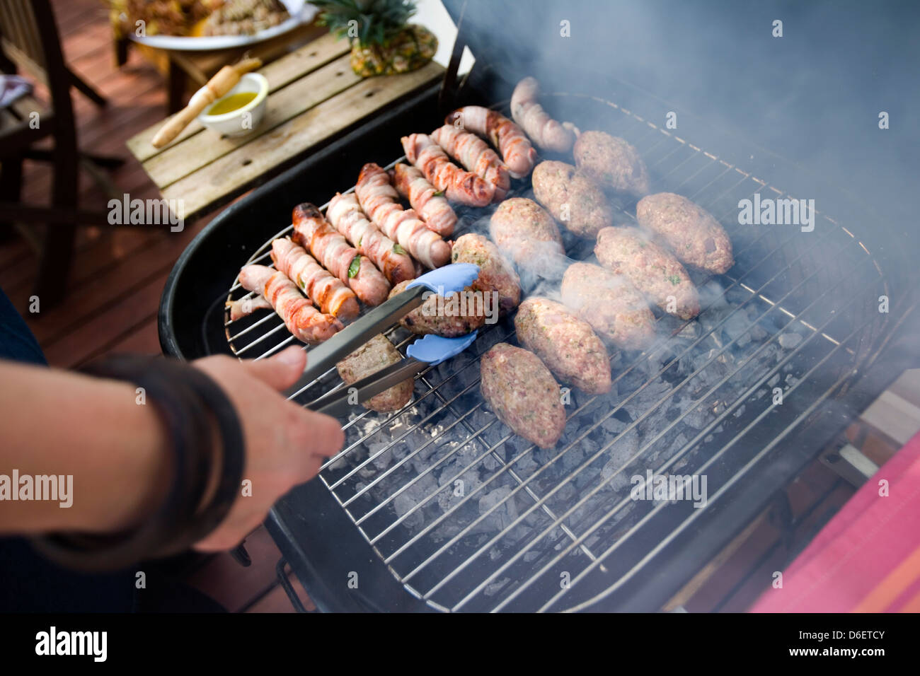 Cooking barbecue food Stock Photo - Alamy